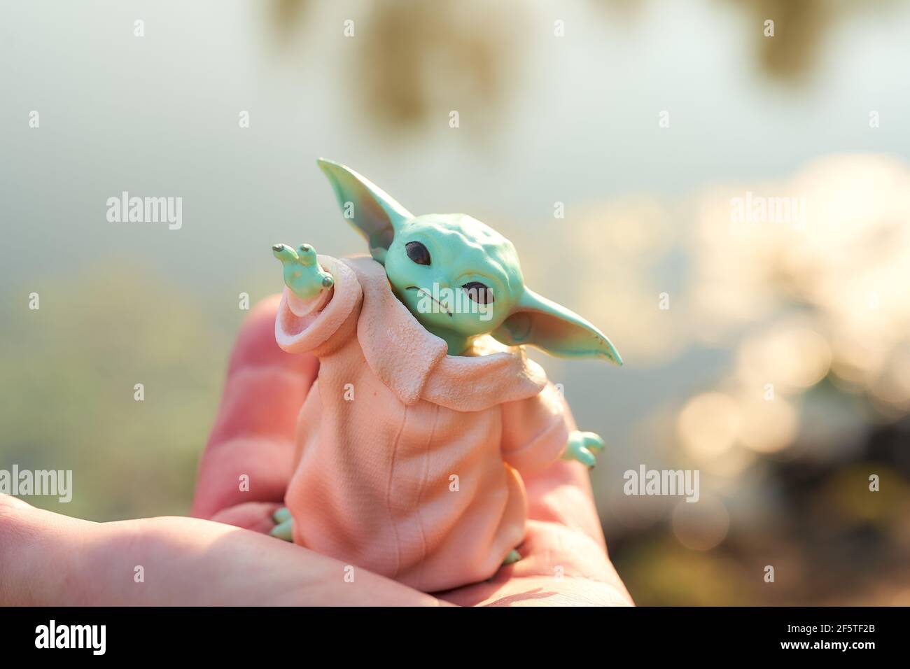 October, 2020: Display of Baby Yoda, an action figures, standing on ...