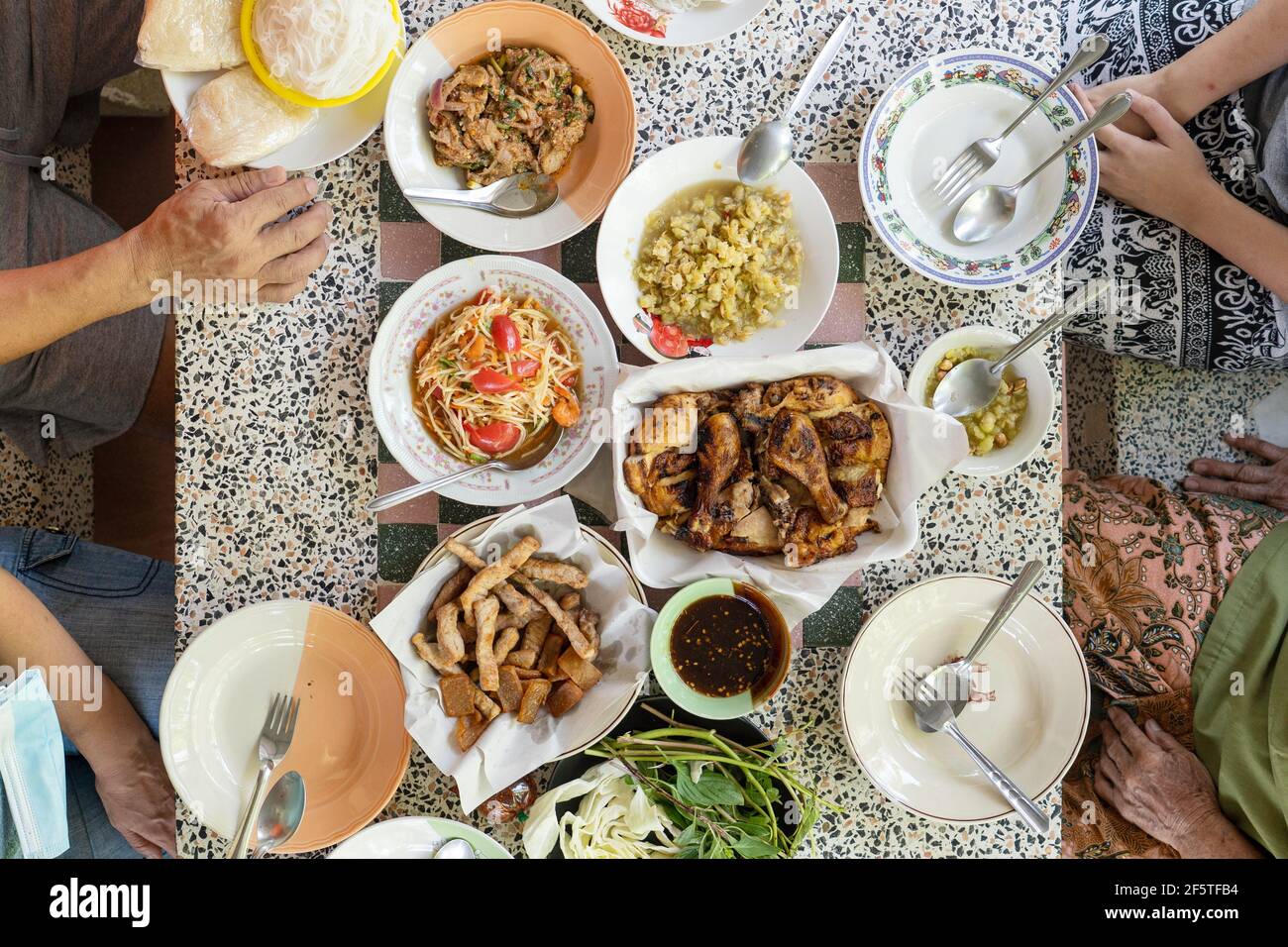 Family eating rice cuisine hi-res stock photography and images - Alamy