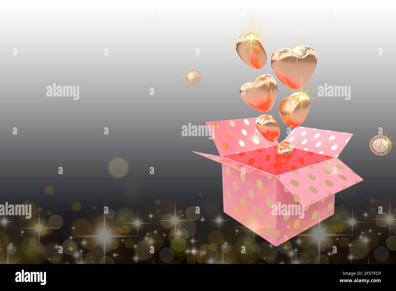 Glossy metallic golden balloons flying out of box composition with hi ...