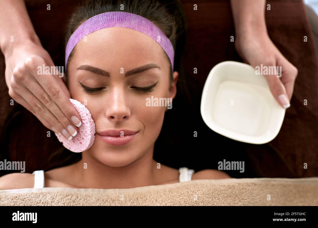 Woman having treatment of cleaning skin, cosmetic and skincare Stock ...