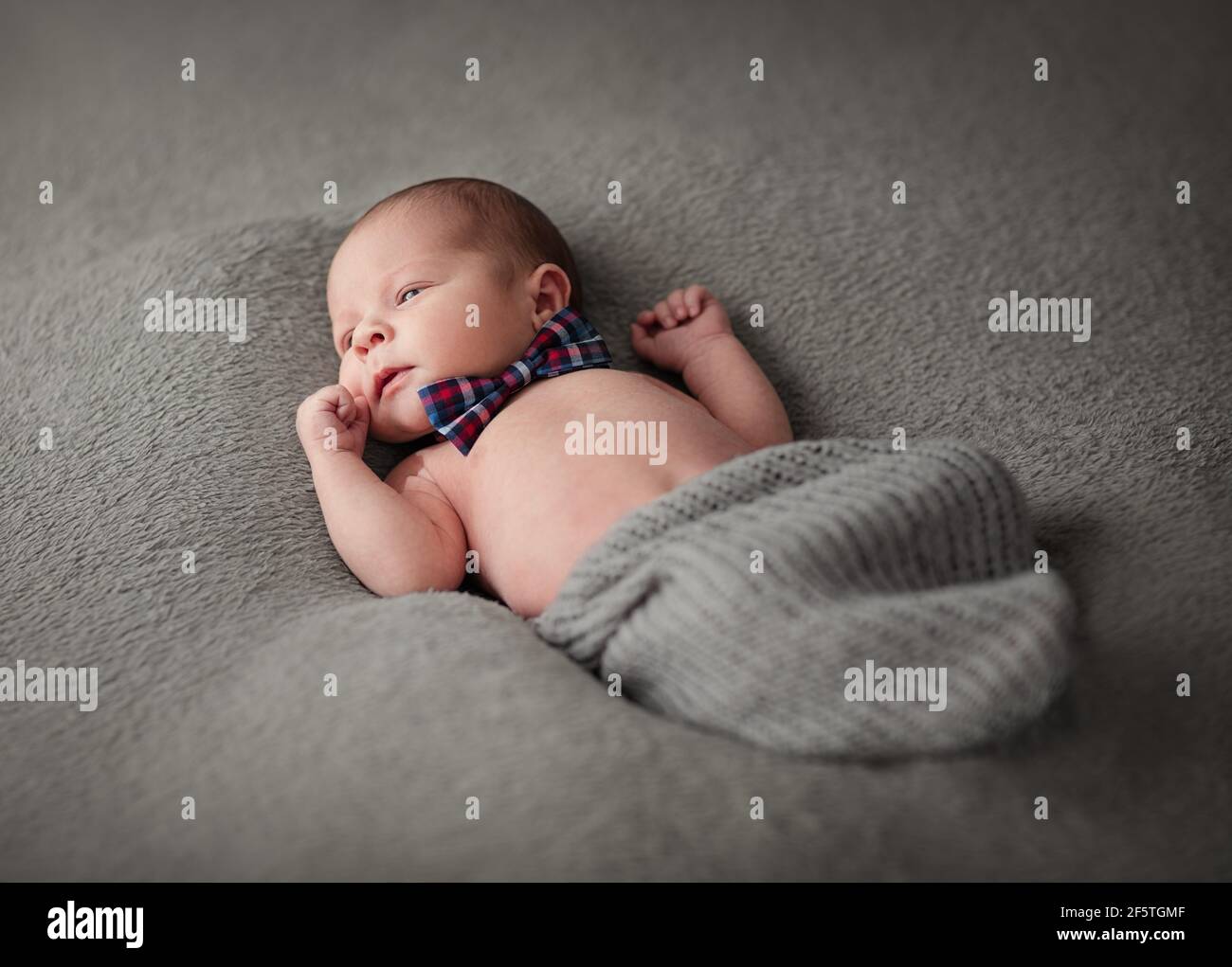 Newborn baby boy fancy dressed, concept newborn photography Stock Photo ...