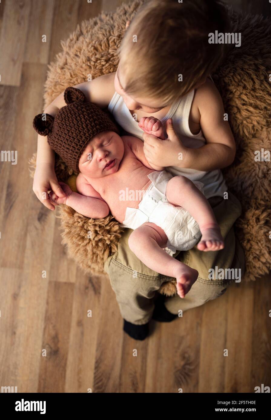 children brother and brother newborn baby Stock Photo - Alamy