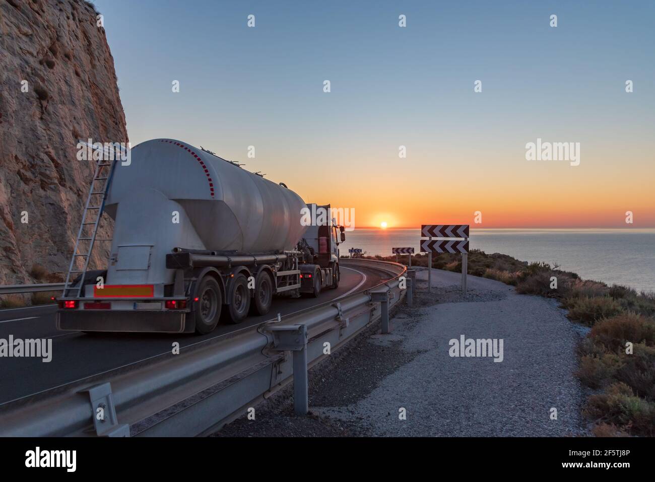 Silo truck for the transportation of bulk cement on a mountain road by ...