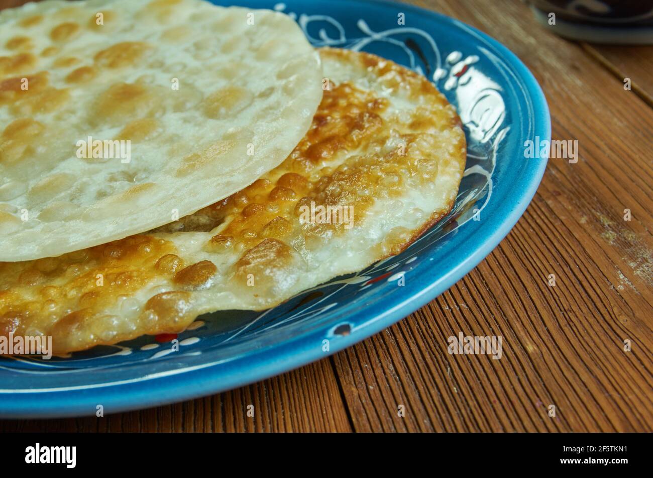 Kitcha fir-fir - Ethiopian flatbread made with wheat flour Stock Photo ...