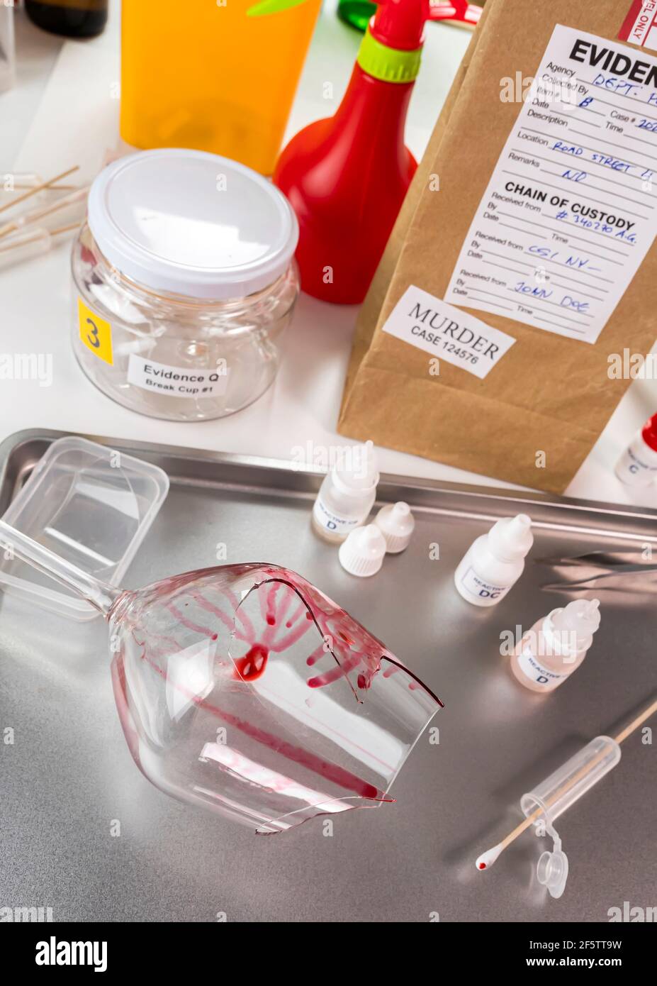 Blood-stained glass sample in an evidence cup, concept image Stock ...