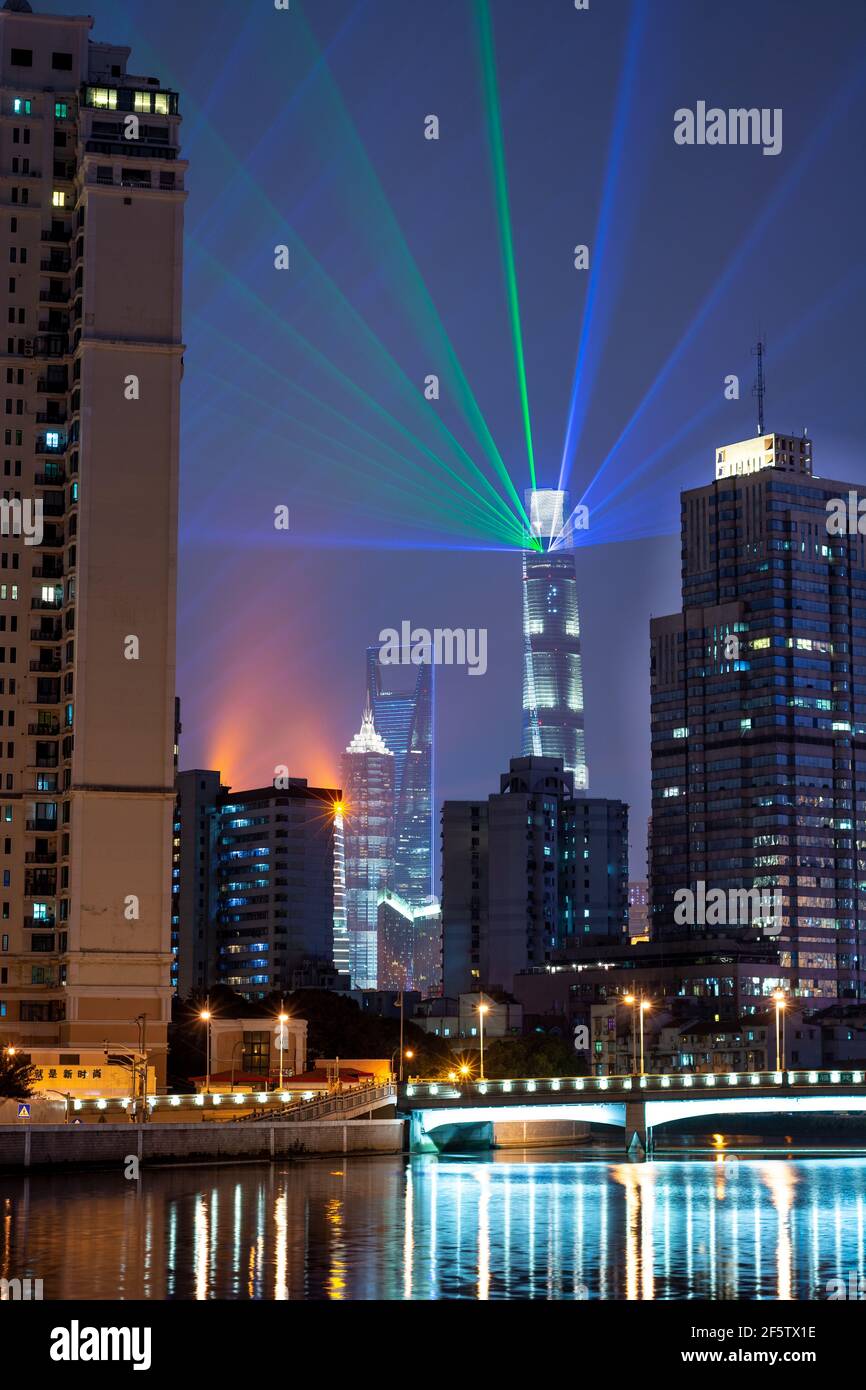 Shanghai light show at night with residential buildings Stock Photo - Alamy