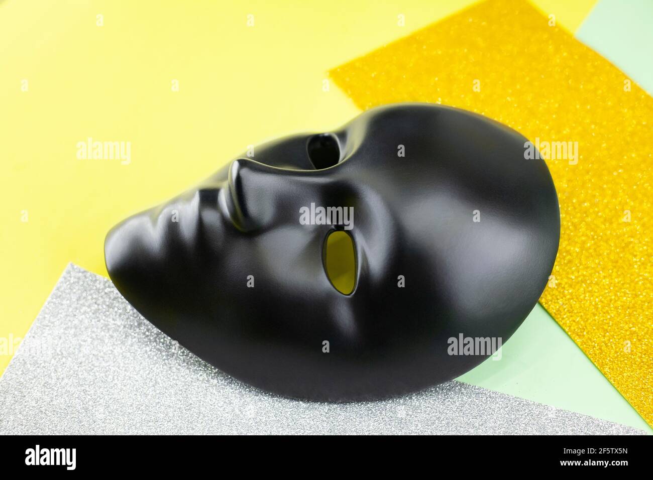 black carnival mask completely hiding the face for a woman or a man ...