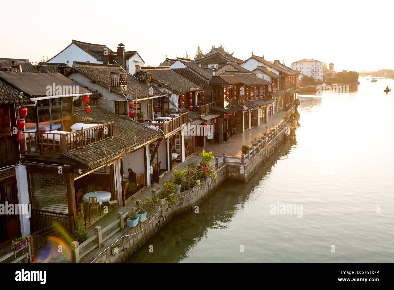 Waterfront of traditional chinese water town Zhujiajiao at sunset Stock ...