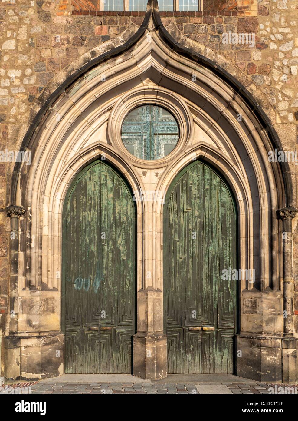 The old gothic-style doors of the St. Mary's Church in Berlin, Germany ...