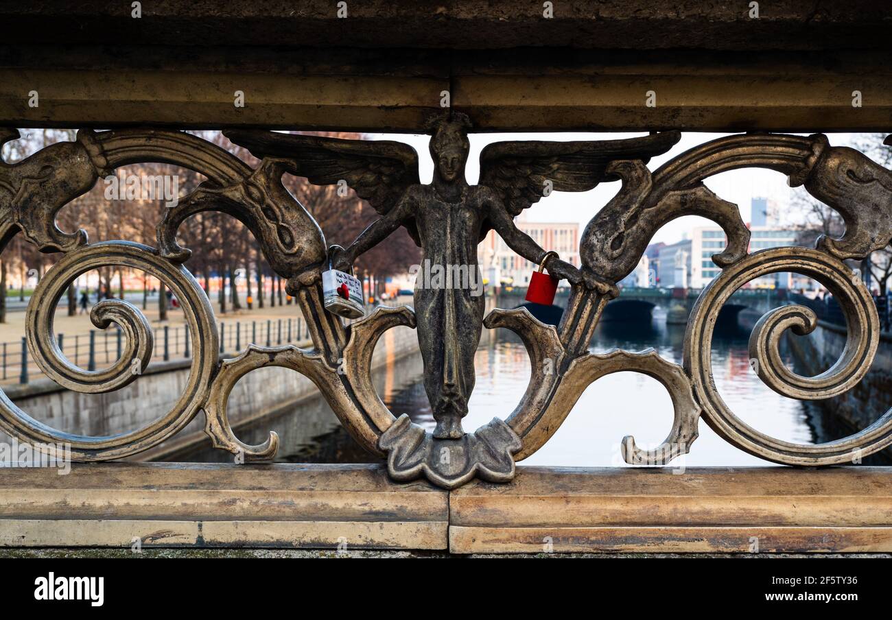 Cute padlocks on the parapet detail woman hands on the Berlin Eiserne ...