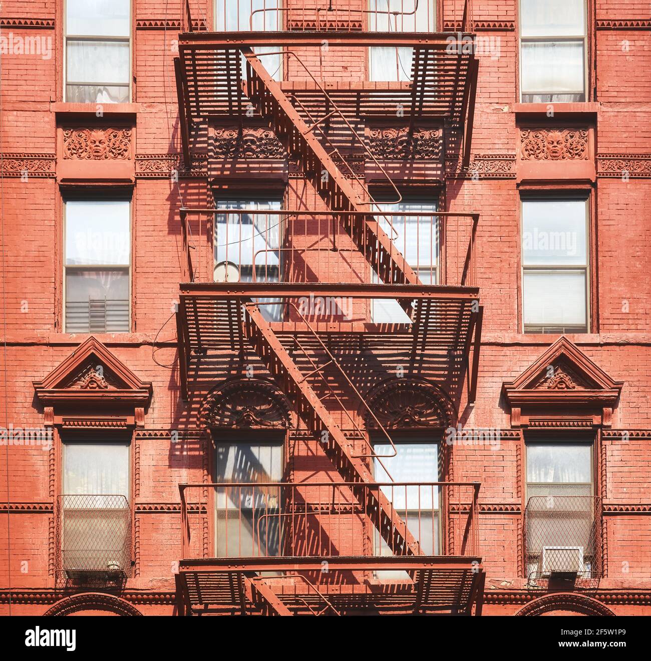Old red building with iron fire escape, New York City, USA Stock Photo ...
