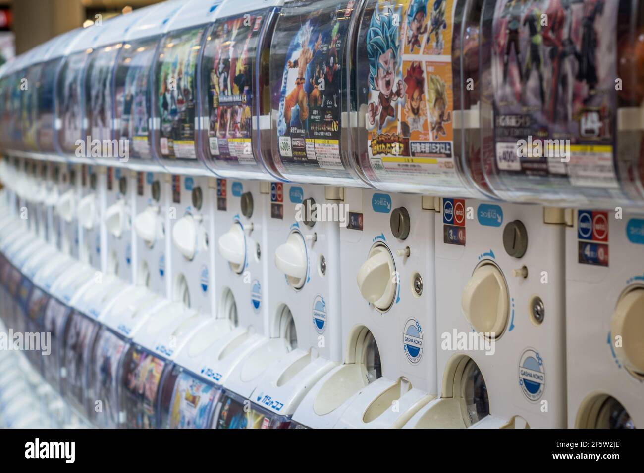Long line of popular gashapon ガチャポン capsule plastic toy vending ...