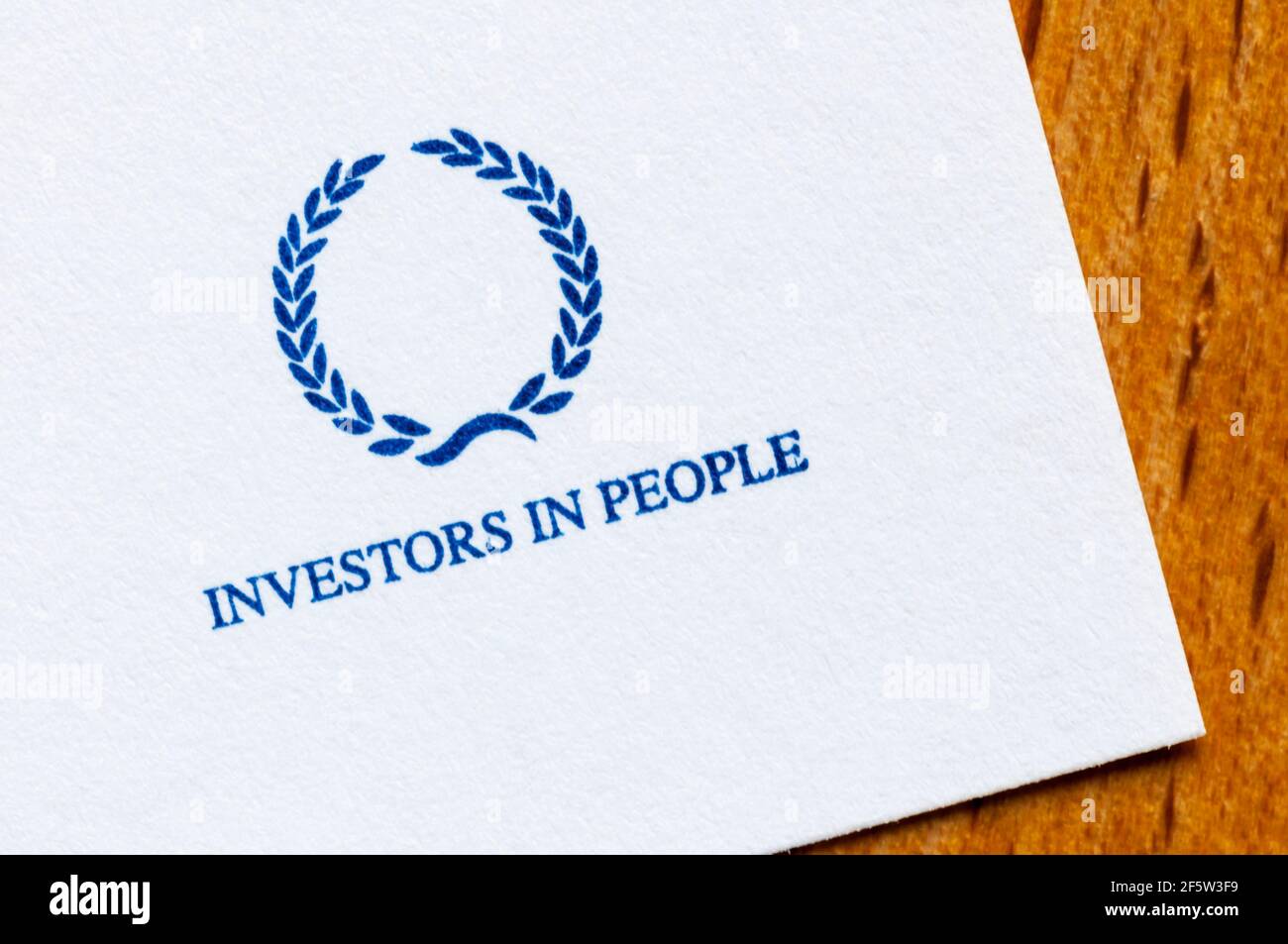 Investors in People logo on a document Stock Photo - Alamy