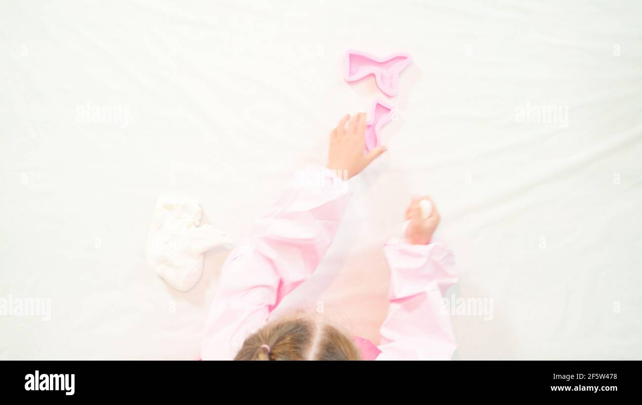 Flat lay. Step by step. Making mermaid tail from modeling clay in ...