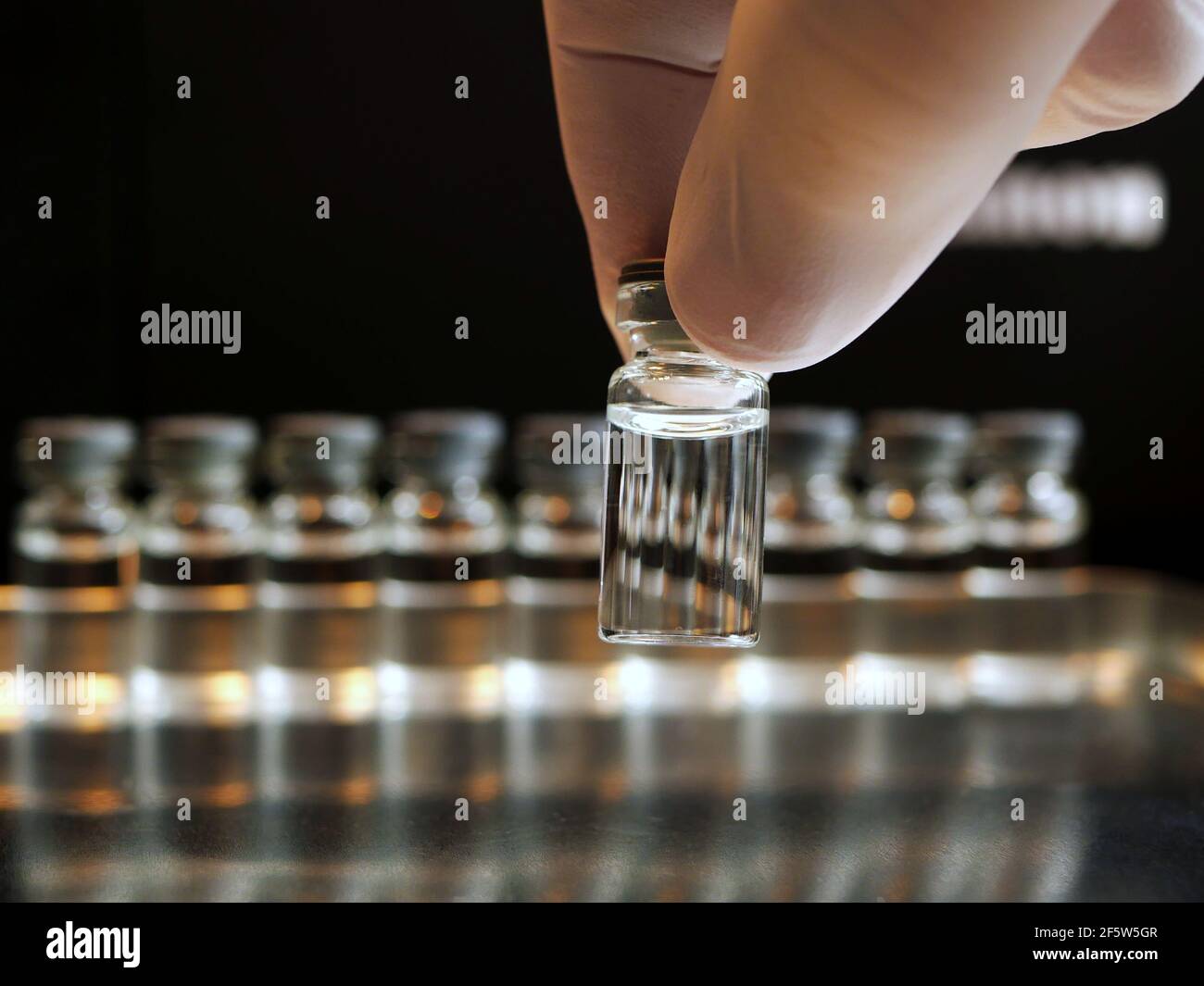 Medication bottle glove hi-res stock photography and images - Alamy