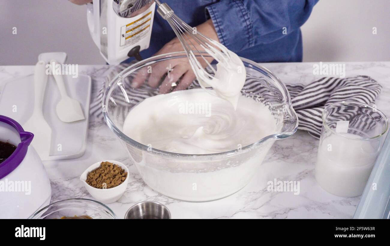 Step by step. Preparing homemade chocolate ice cream in a hand kitchen ...
