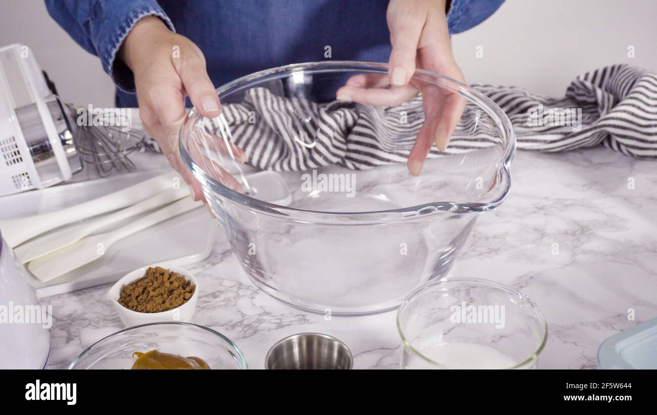 Step by step. Preparing homemade chocolate ice cream in a hand kitchen ...