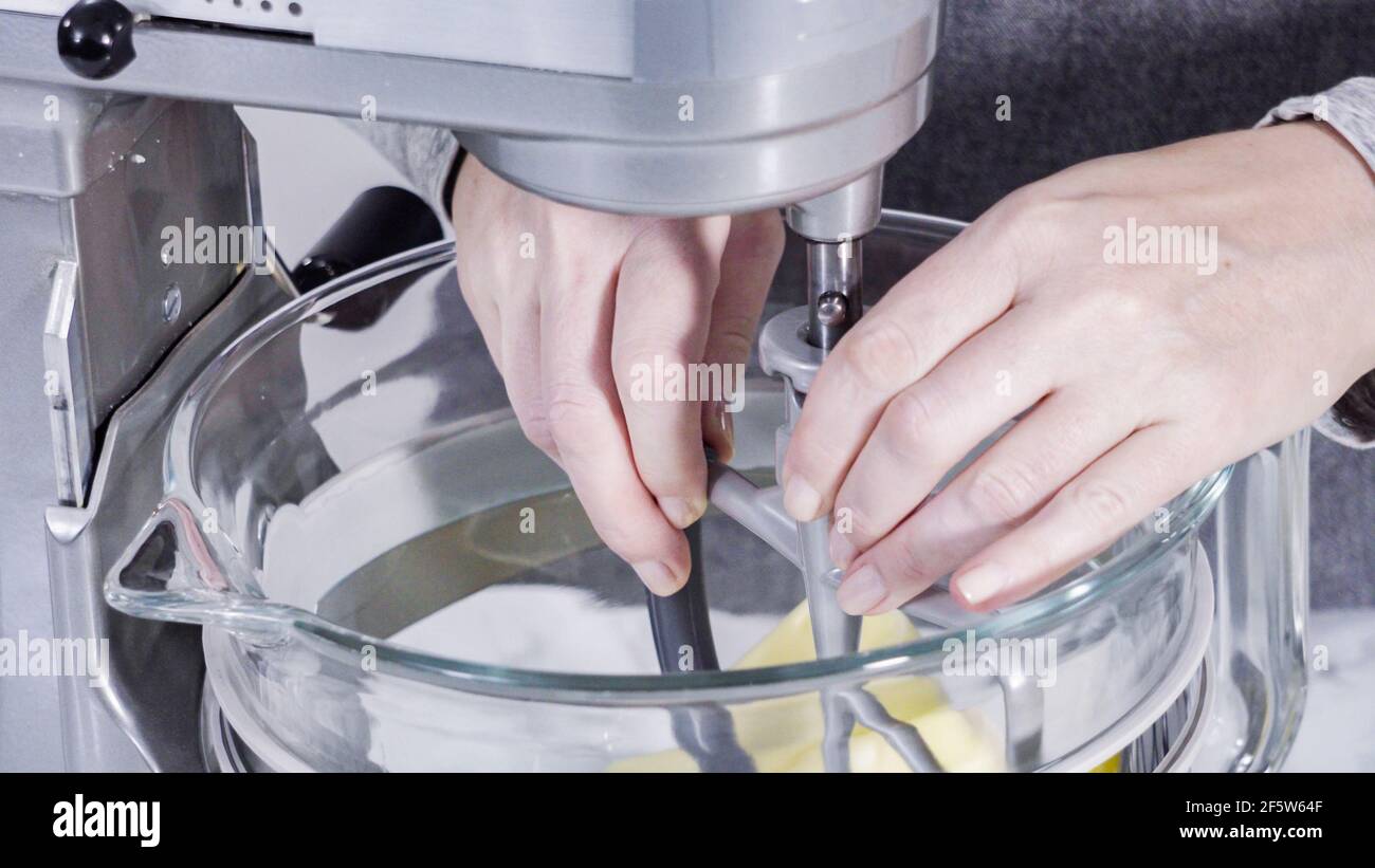 Step by step. Mixing ingredients into the batter for lemon pound cake ...