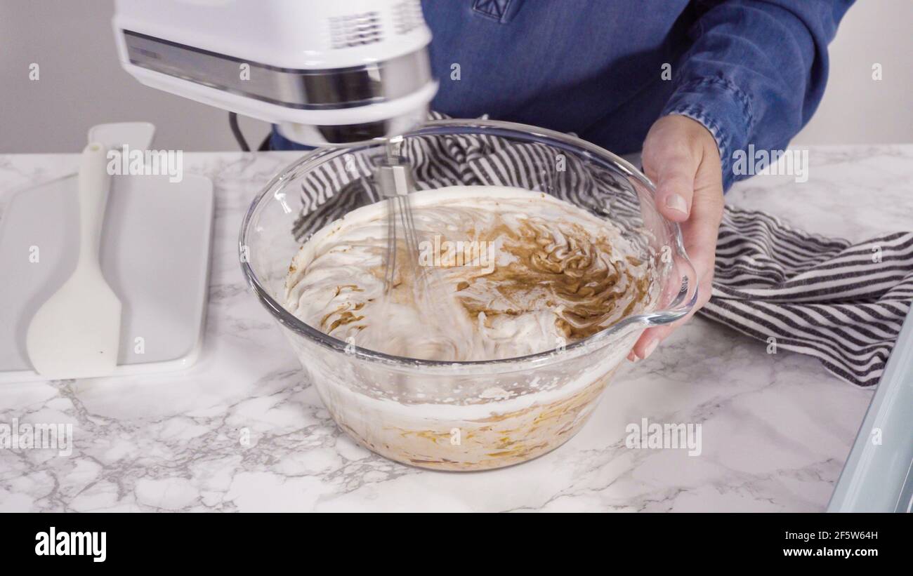 Step by step. Preparing homemade chocolate ice cream in a hand kitchen ...