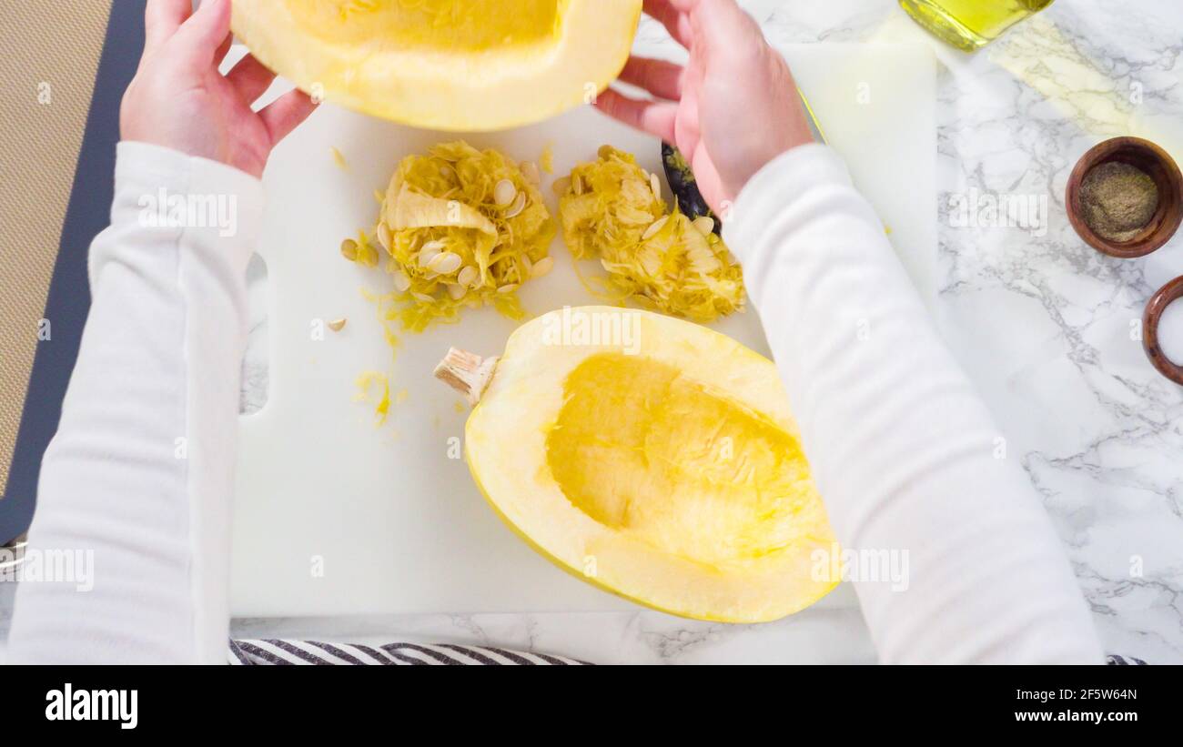 Step by step. Flat lay. Preparing organic spaghetti squash with olive ...