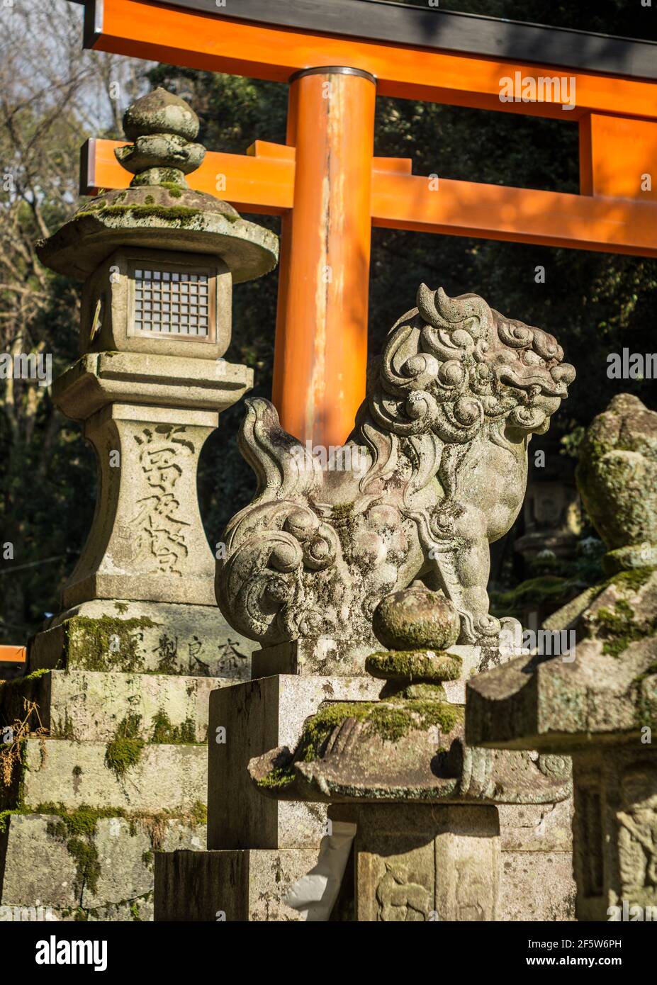 A komainu lion-dog statue guarding the entrance to Kasuga Taisha Grand ...