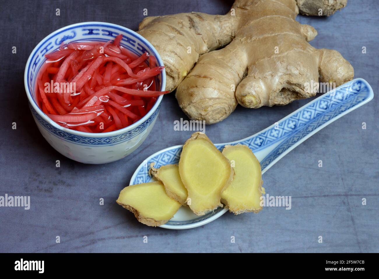 Pickled ginger in small bowls and ginger slices, ginger root, Germany ...