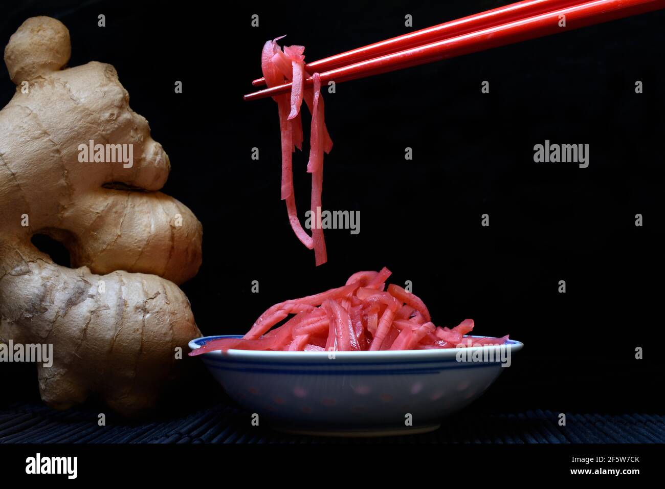 Pickled ginger on chopsticks, ginger root, Germany Stock Photo - Alamy