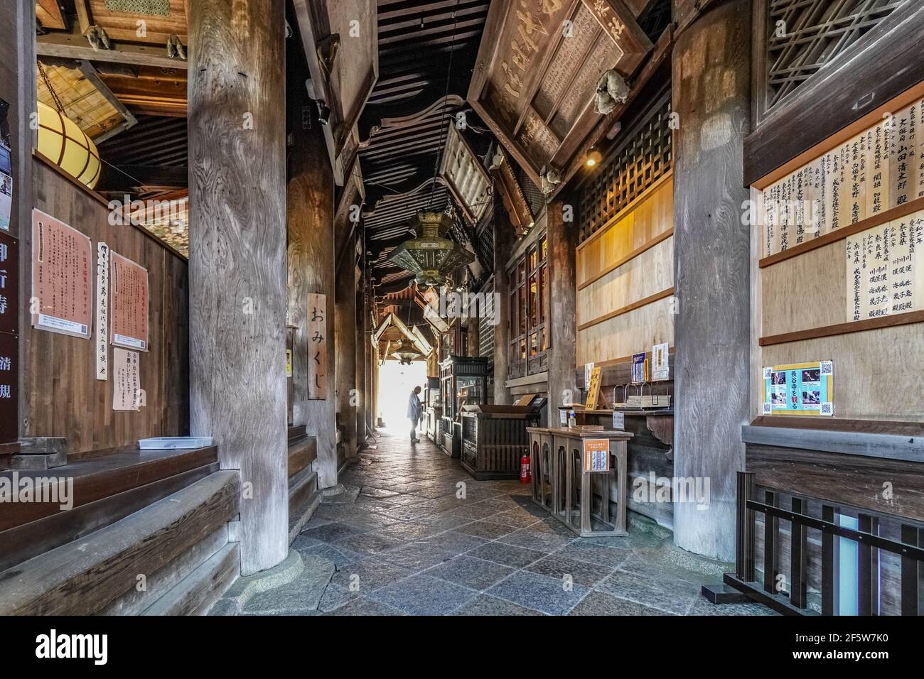 Japanese Pilgrim (ohenro) praying inside Hase-dera Temple, Buddhist ...