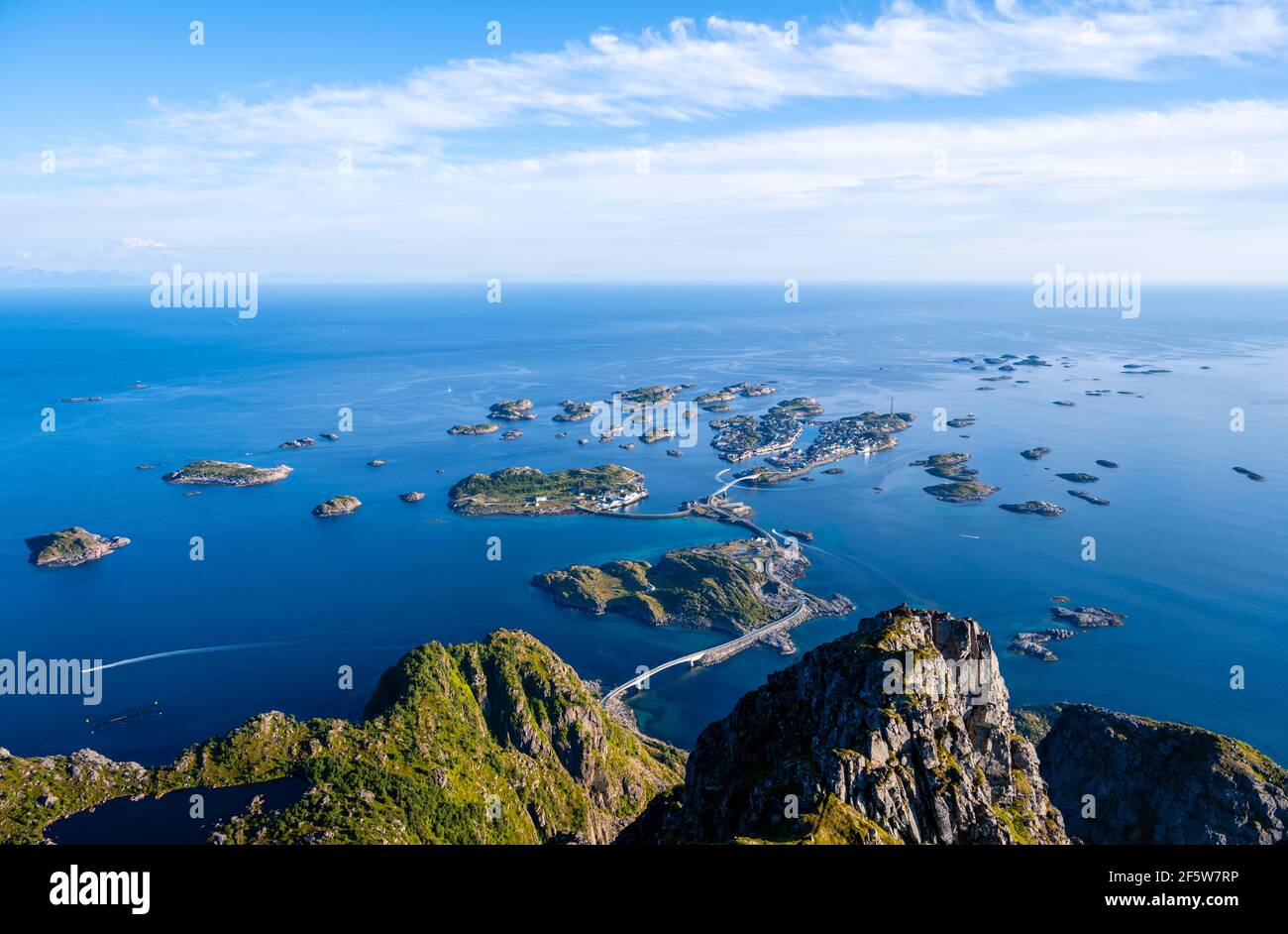 Houses on small rock islands in the sea, village view of Henningsvaer ...