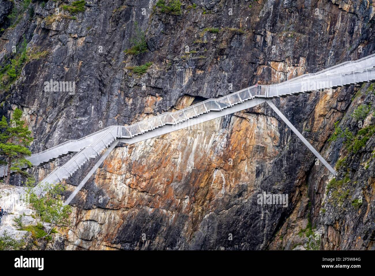 Metal bridge over a rock gorge at Voringfossen waterfall, Eidfjord ...