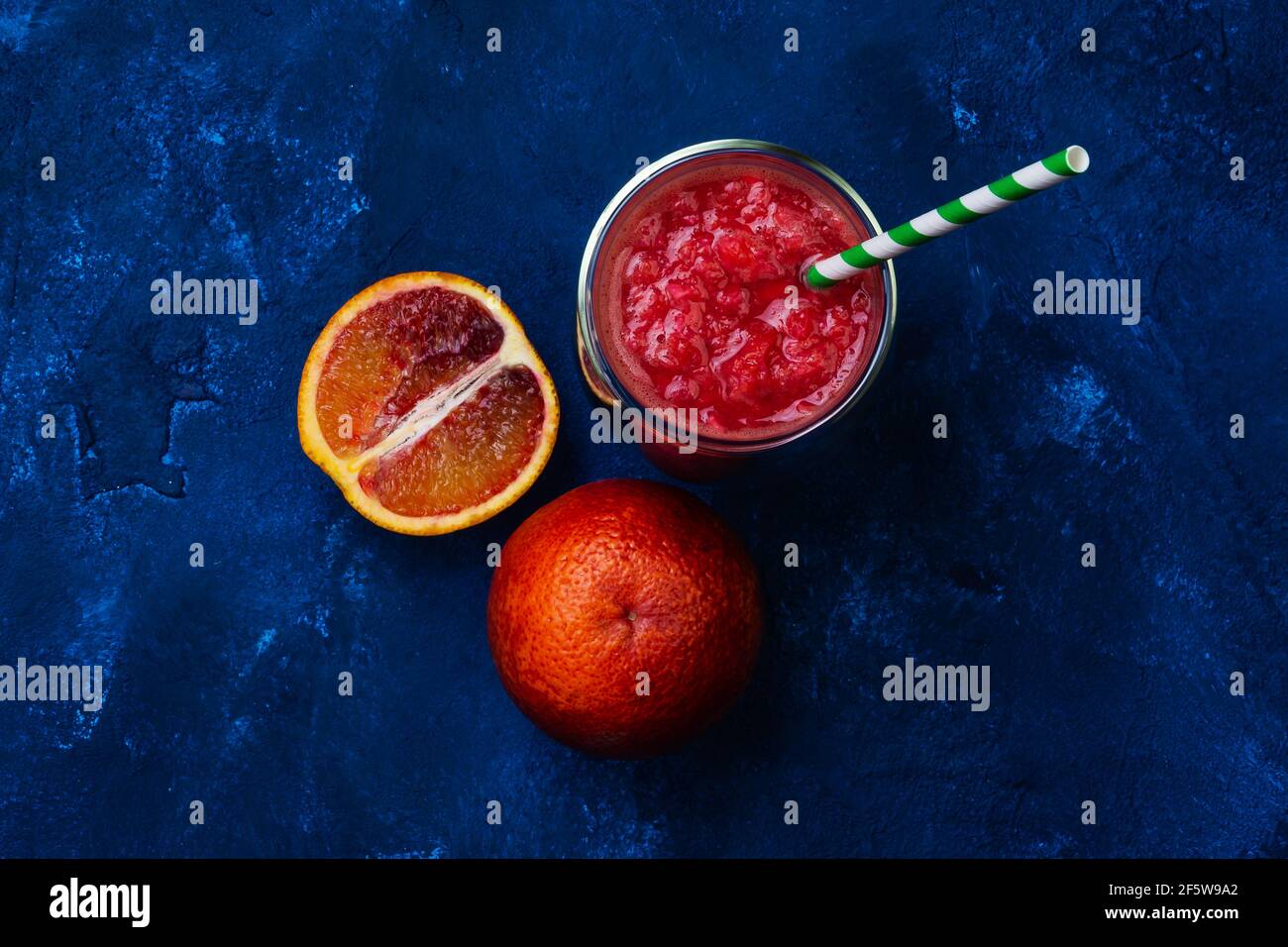 Red orange juice in a glass. Cocktail from Sicilian oranges. Creative ...