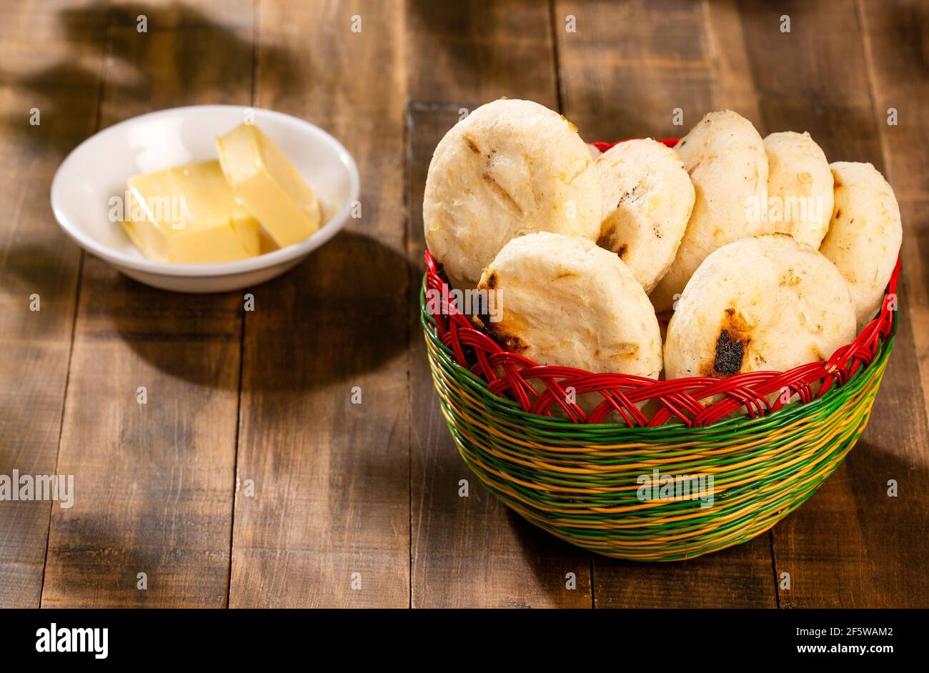 Small Colombian corn arepas with butter - Zea mays Stock Photo - Alamy