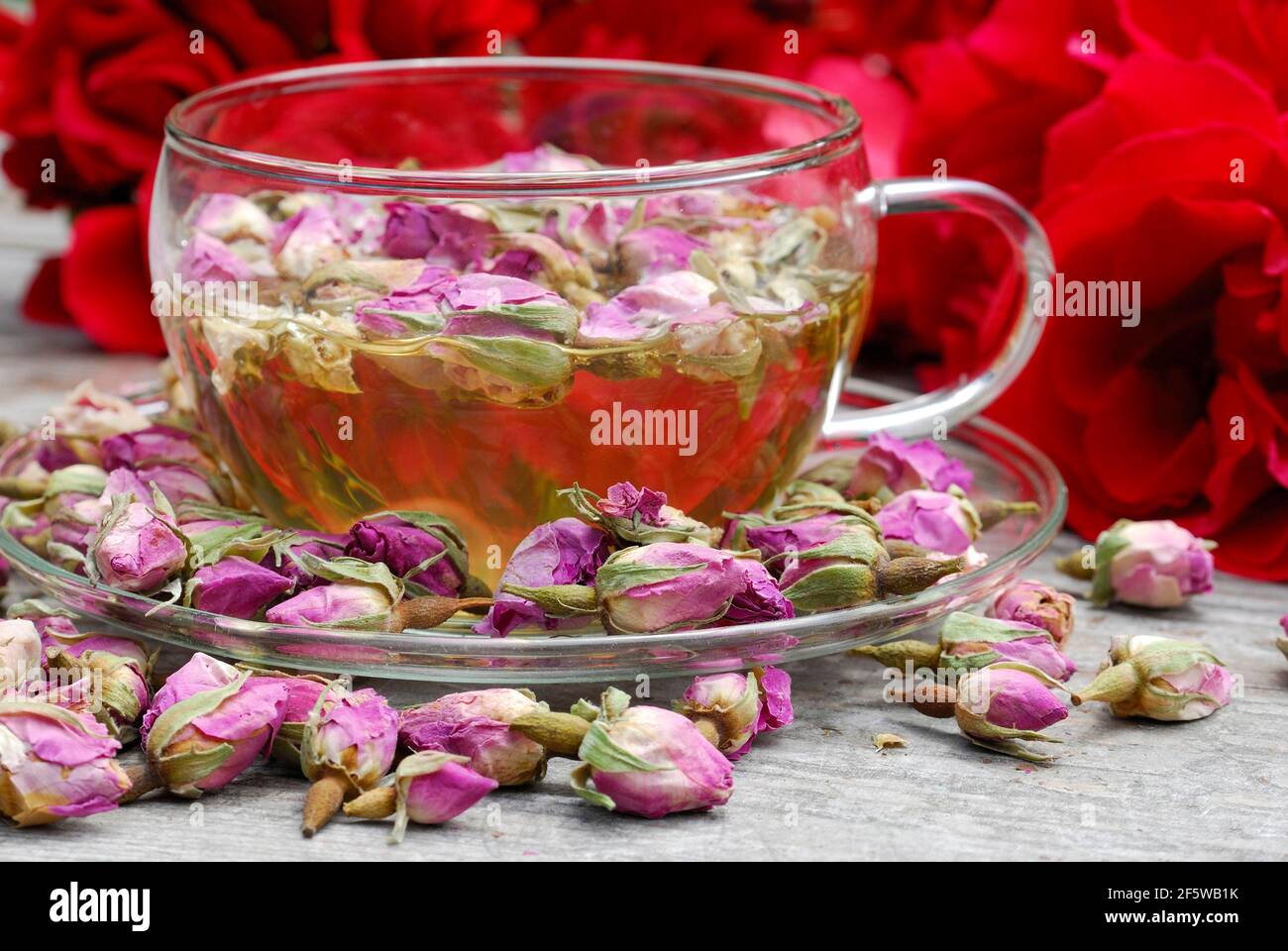 Rose tea in cup and rose buds, rose petals, rose blossom tea Stock ...