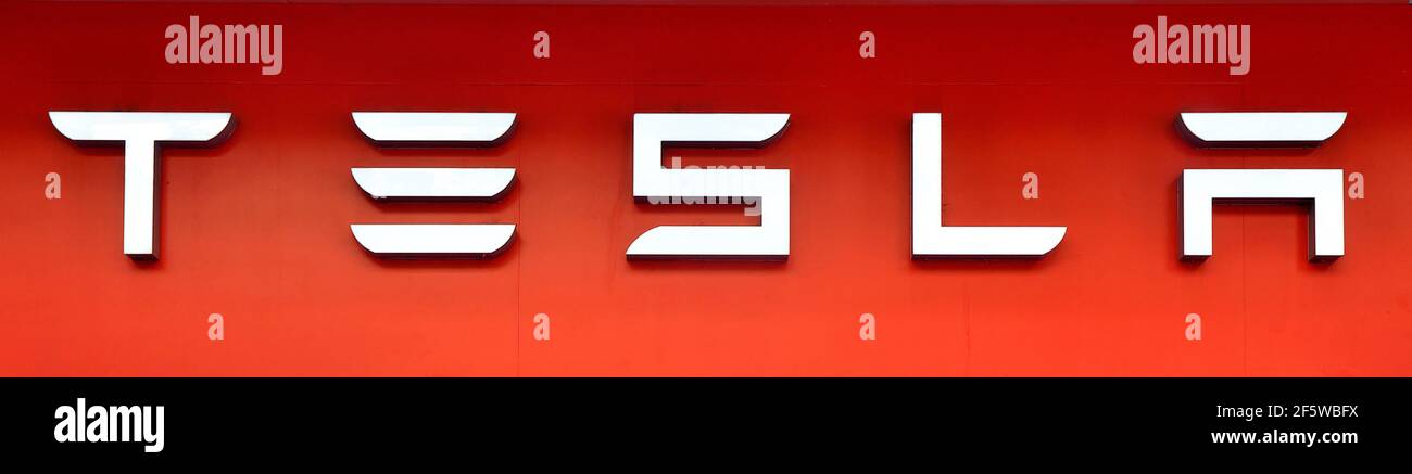 Tesla lettering, corporate identity, cropped, red background Stock ...