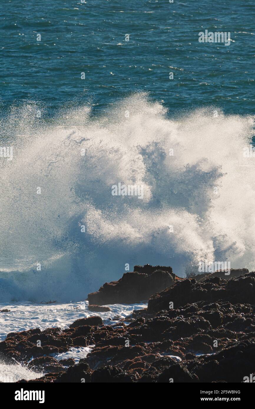 Large wave crash into rocky shore on bay of fundy coast Stock Photo - Alamy