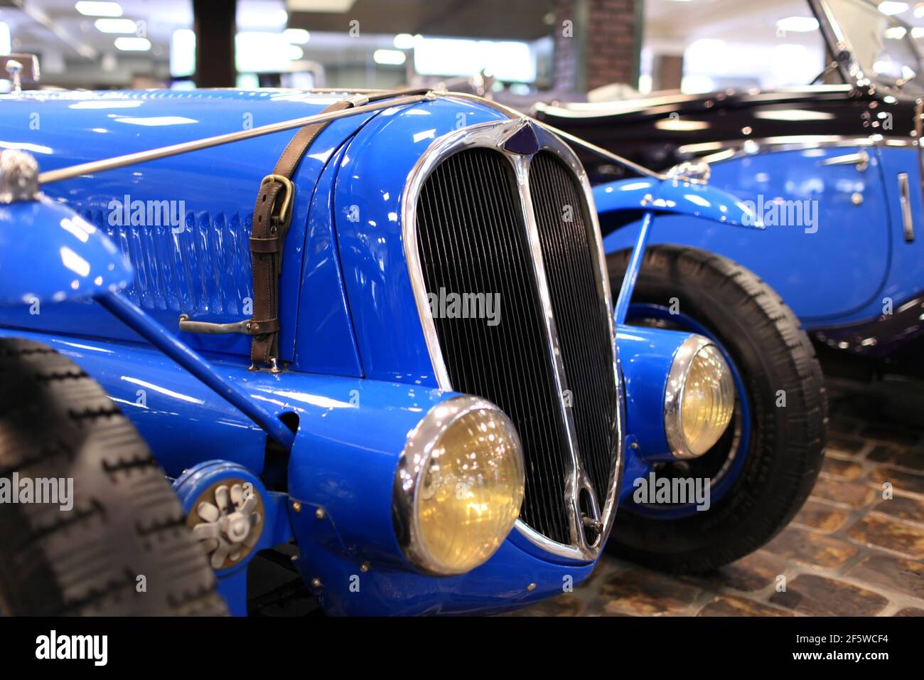 Details of the vintage blue car indoor Stock Photo - Alamy