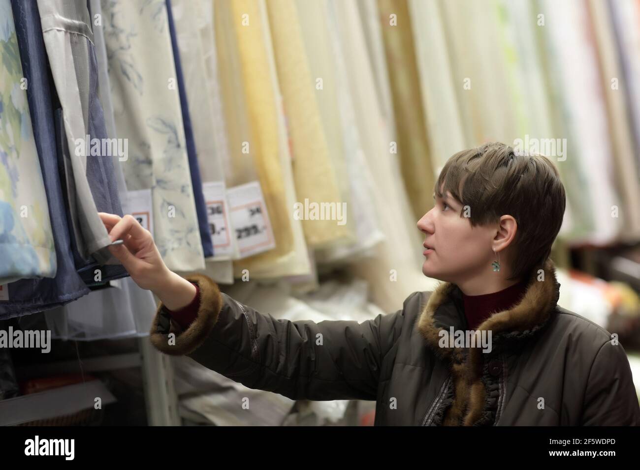 Woman selling fabrics hi-res stock photography and images - Alamy