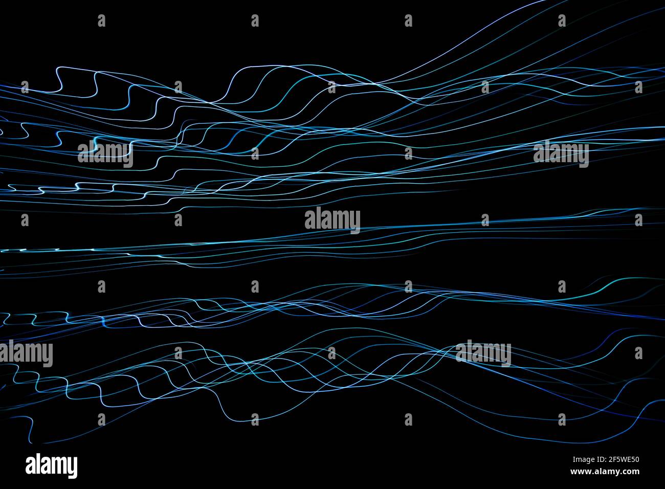 Sound waves in the visible blue color in the dark Stock Photo - Alamy