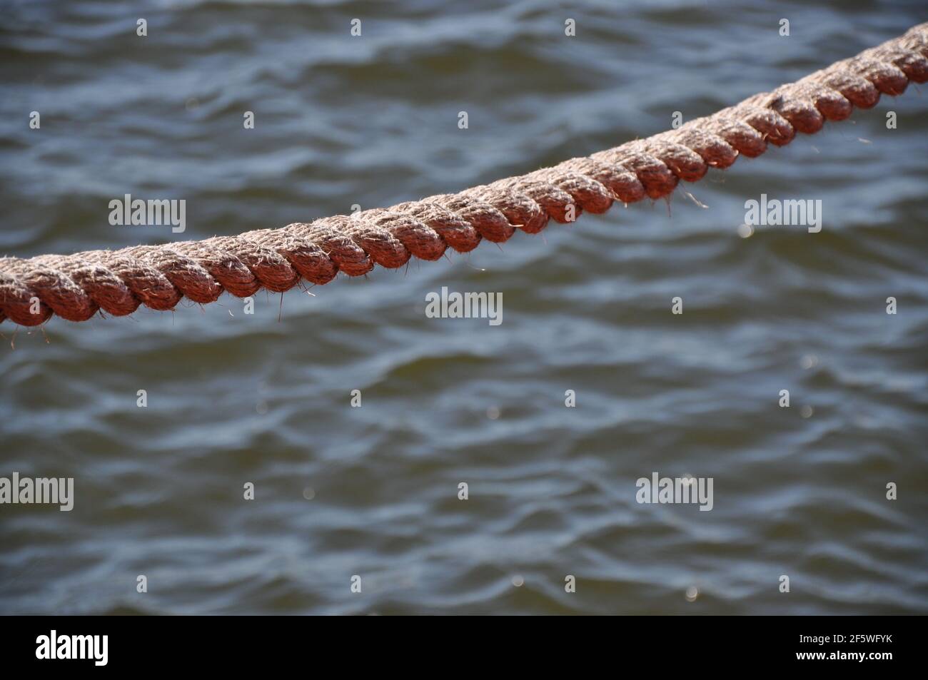 rope in front of water Stock Photo - Alamy