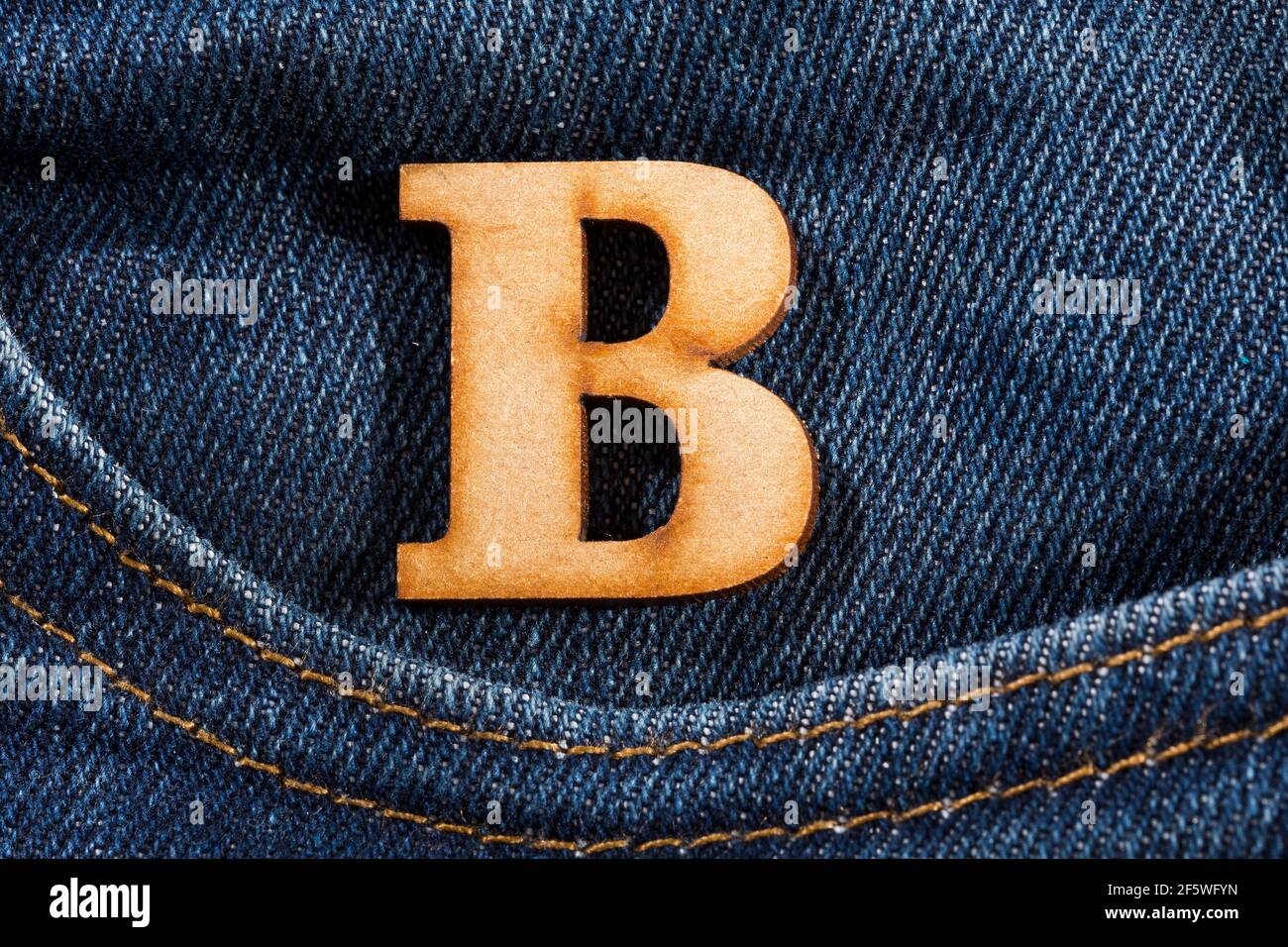 Letter B of the alphabet - blue jeans texture background Stock Photo ...