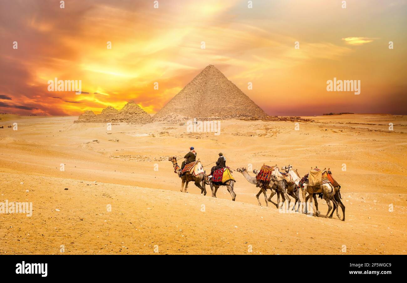 Egyptian pyramids in the desert at sunset Stock Photo - Alamy