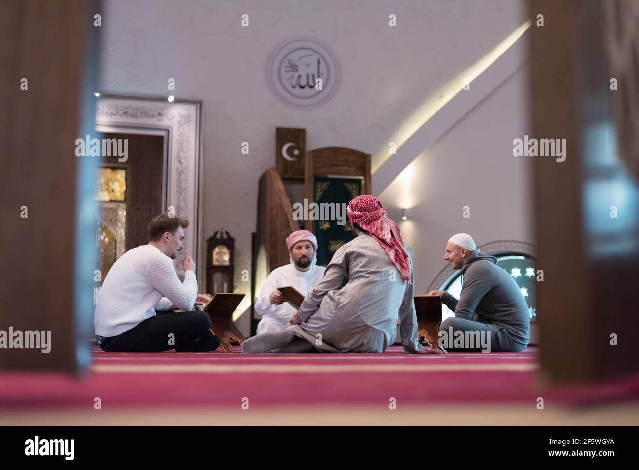 Group of Muslims reading, reciting and remembering Quran during the ...
