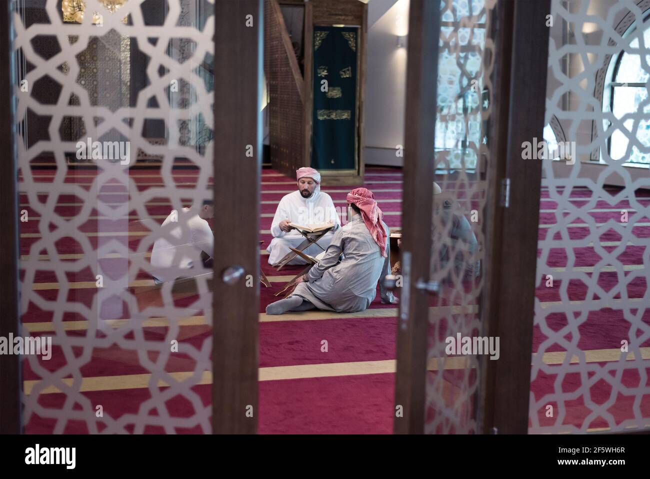 Group of Muslims reading, reciting and remembering Quran during the ...