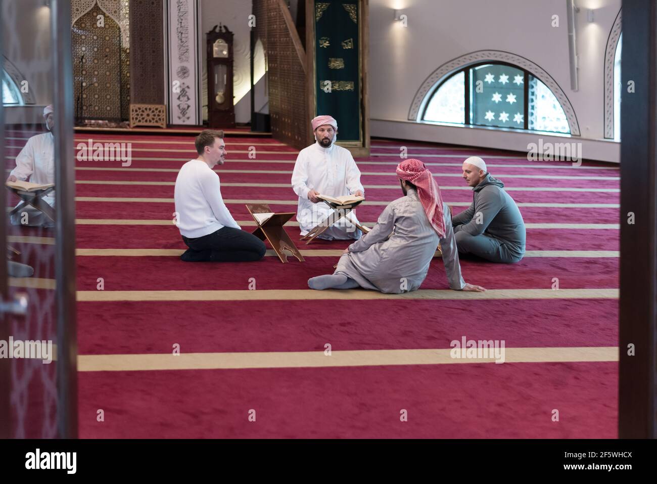 Group of Muslims reading, reciting and remembering Quran during the ...