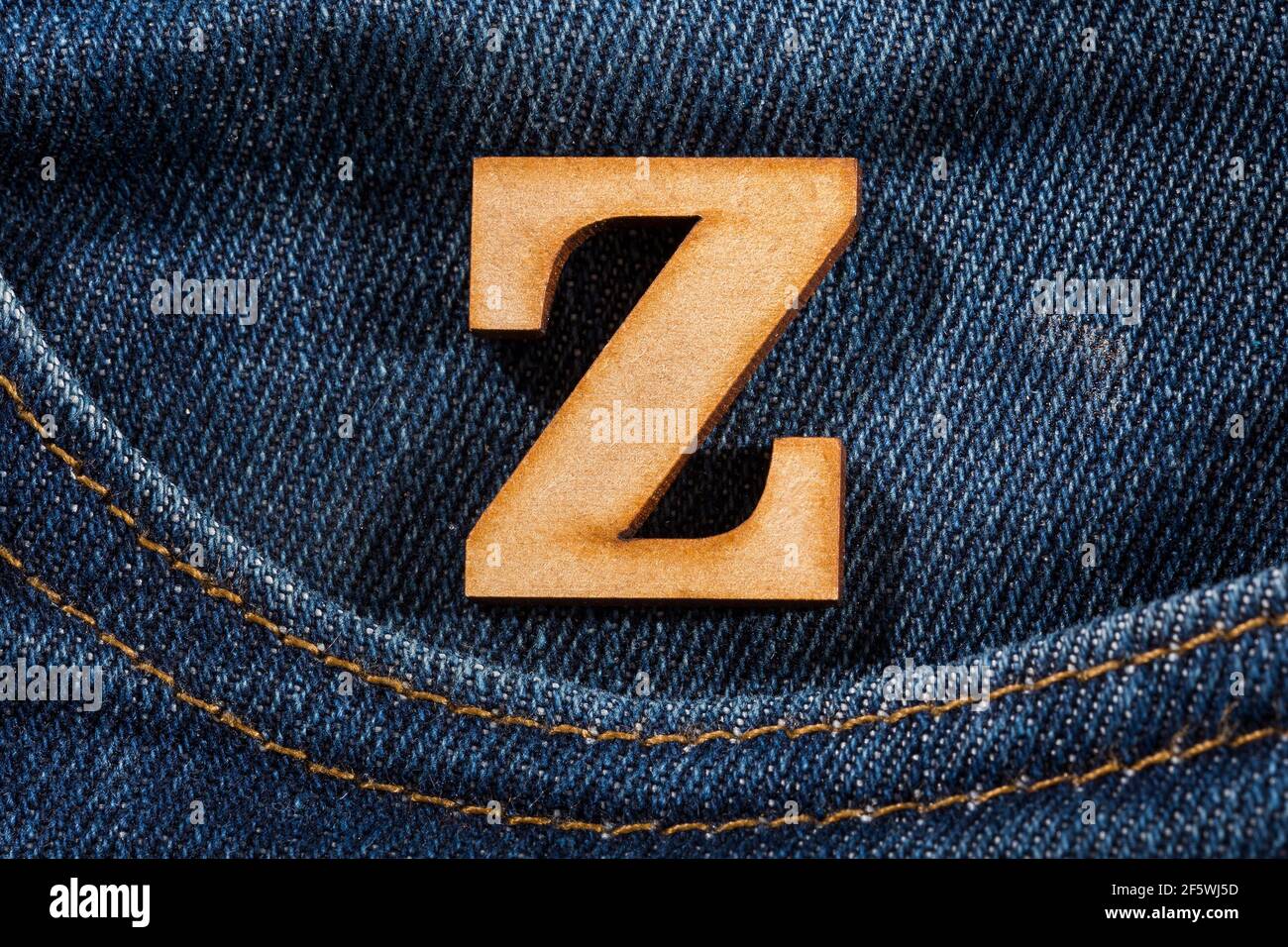 Letter Z of the alphabet - blue jeans texture background Stock Photo ...