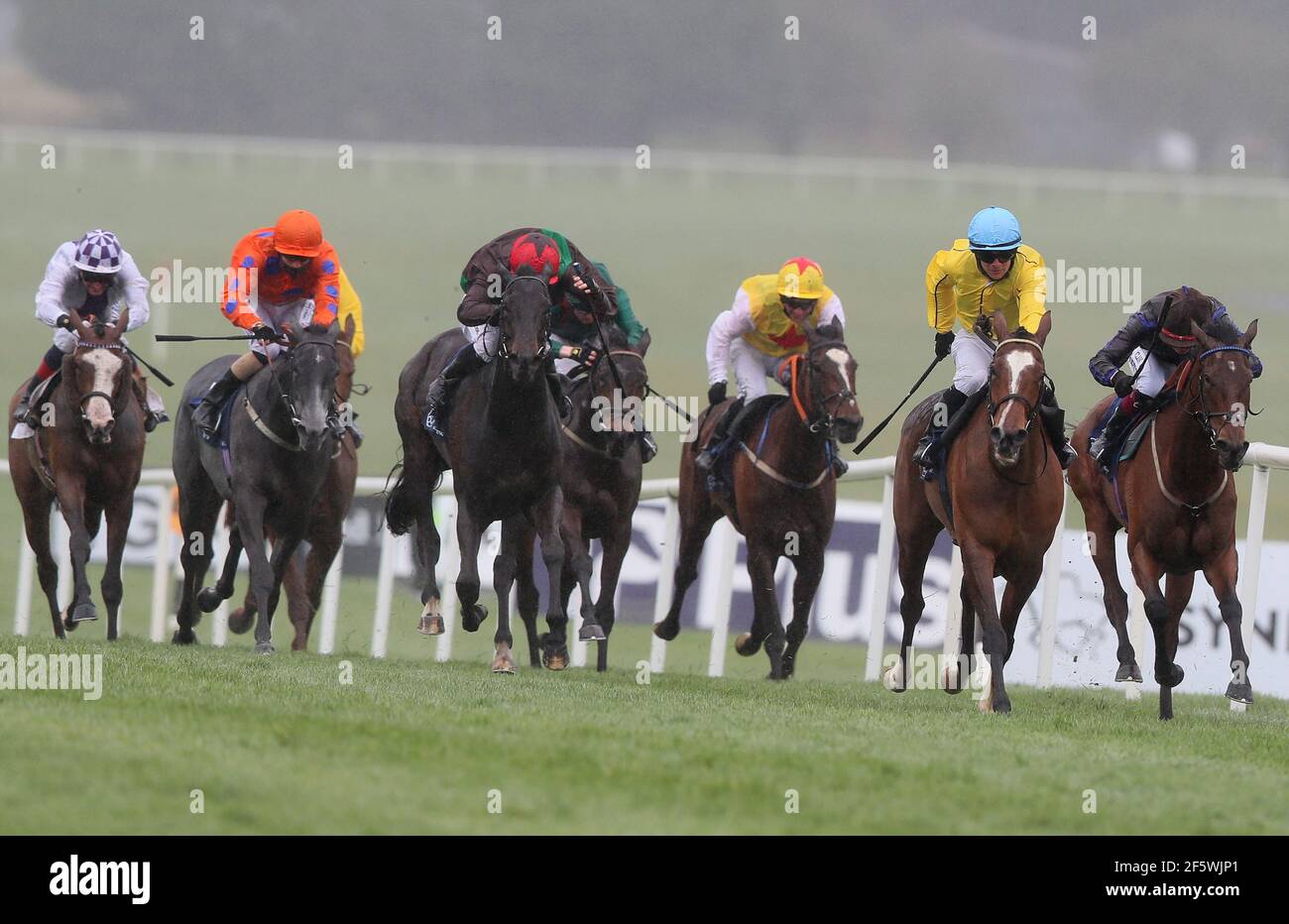 Epona Plays ridden by Wayne Lorden (2nd right) coming home to win the ...