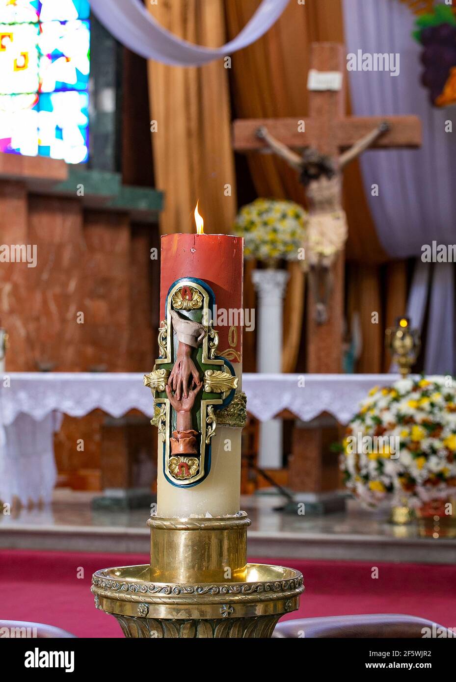 Easter Candle burning, symbol of the Resurrection of Christ Stock Photo ...