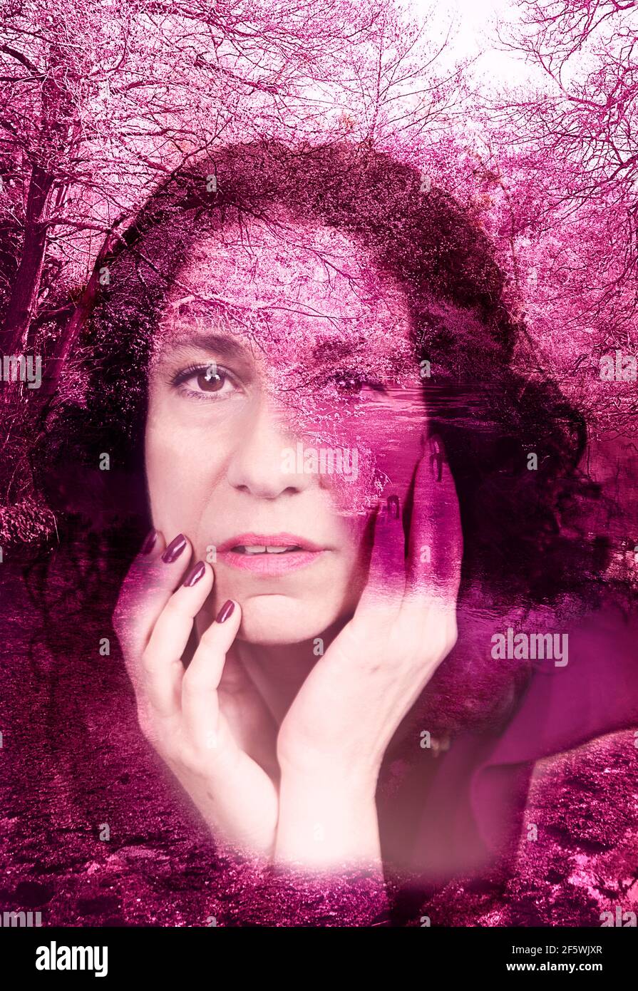 woman fused with nature on lilac colors Stock Photo - Alamy