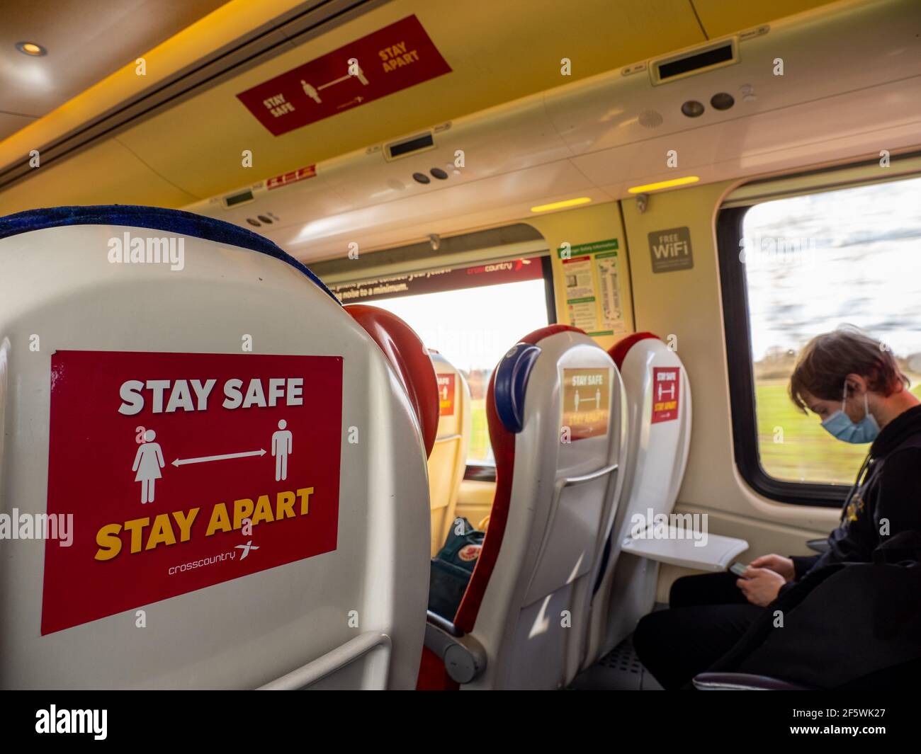 Social distancing regulations displayed on a train in England Stock ...