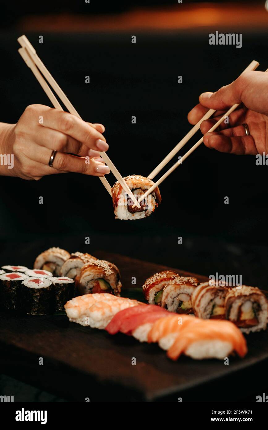 Hands eating chopstick hi-res stock photography and images - Alamy